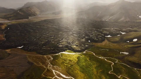 Sun rays shining down in aerial view of ... | Stock Video | Pond5