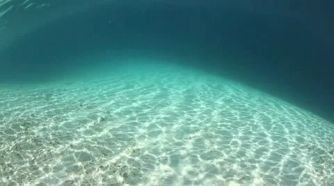 Sunlight and Sand Slope Underwater | Stock Video | Pond5