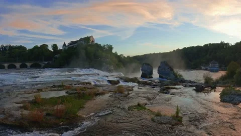 Sunset above Rhine waterfalls with rumbl... | Stock Video | Pond5
