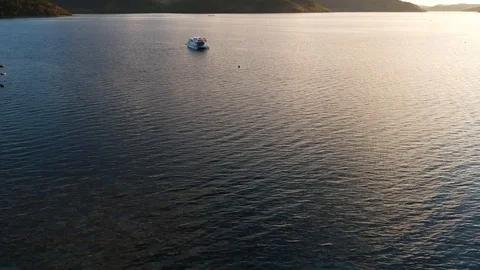 sunset with boat, shot with drone. | Stock Video | Pond5