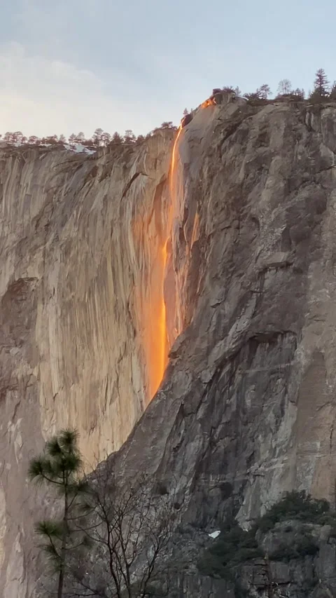 Sunset Creates Illusion of a Waterfall o... | Stock Video | Pond5