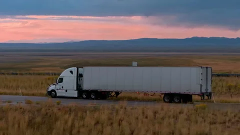 Sunset Drive: Semi Truck in Desert Stepp... | Stock Video | Pond5