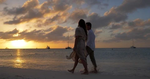 Sunset, Married Couple on Romantic Walk ... | Stock Video | Pond5