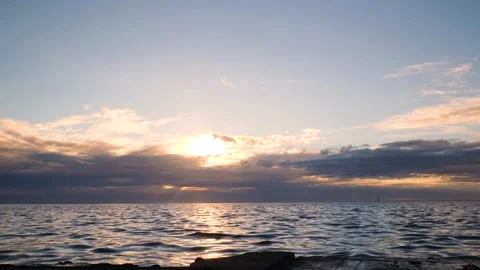 Sunset over beautiful gulf bay waters fr... | Stock Video | Pond5