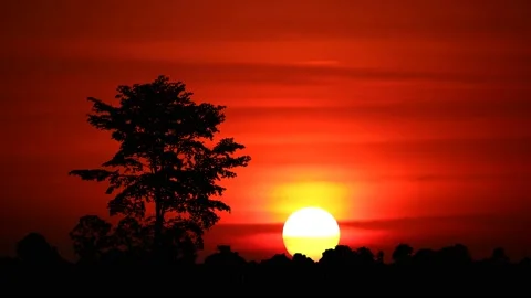 sunset red sky and super blue moon rise ... | Stock Video | Pond5
