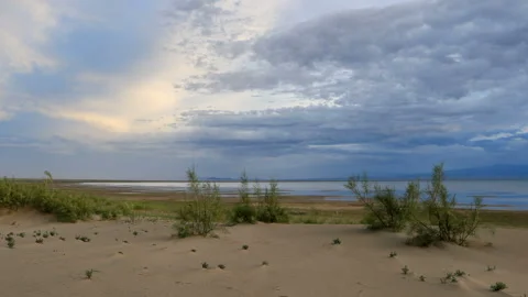 Sunset on the salted lake Durgun Nuur, M... | Stock Video | Pond5