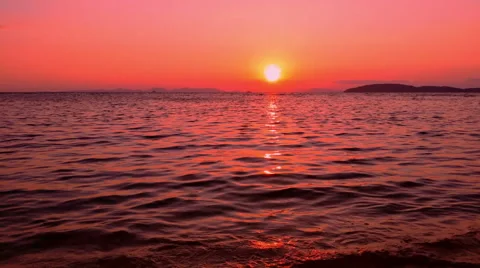 Sunset on sea coast. Clean evening sky a... | Stock Video | Pond5