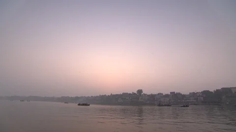 Sunset sky over Ganges River in Varanasi... | Stock Video | Pond5