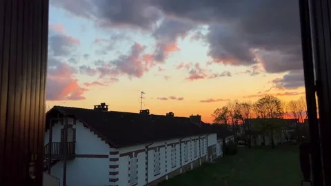 Sunset from the window beautiful sky thr... | Stock Video | Pond5