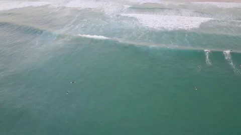 Sunshine Beach With Surfers Floating On ... | Stock Video | Pond5