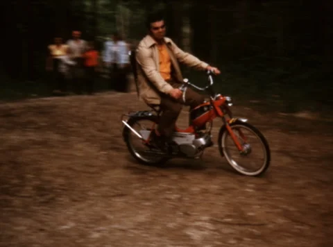 SUPER 8 - lowrider moped - 1973 | Stock Video | Pond5