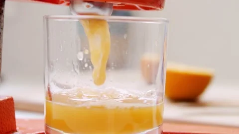 Super slow motion of fresh orange juice ... | Stock Video | Pond5