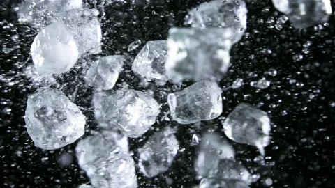 Super slow motion of ice cubes collision... | Stock Video | Pond5