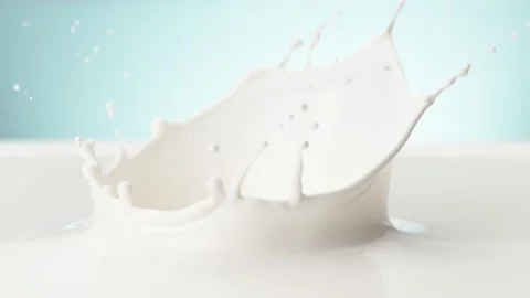 Super slow motion of milk splash isolate... | Stock Video | Pond5