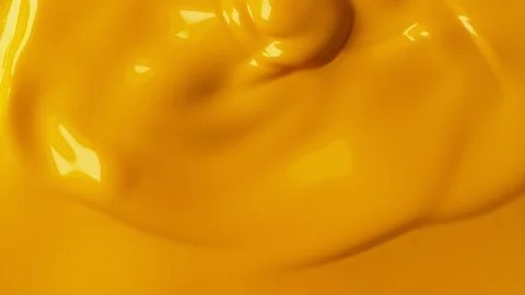 Super slow motion of mixing yellow paint... | Stock Video | Pond5