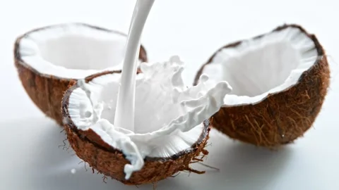 Super Slow Motion Shot of Milk Splashing... | Stock Video | Pond5