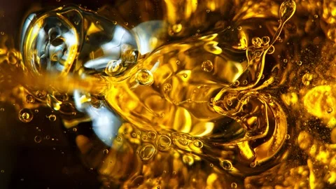 Super Slow Motion Shot of Pouring Oil Is... | Stock Video | Pond5