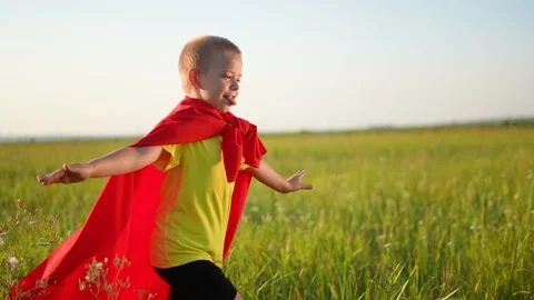 superhero boy running in park. happy fam... | Stock Video | Pond5
