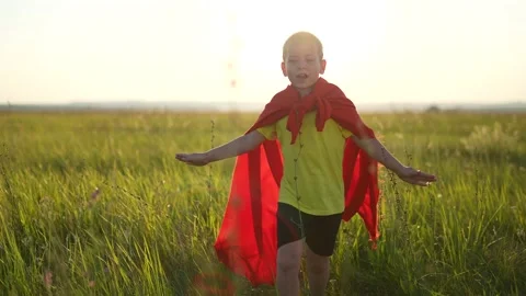 superhero boy running in park. happy fam... | Stock Video | Pond5