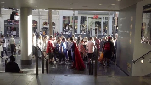 Superman actor in costume in crowd walki... | Stock Video | Pond5