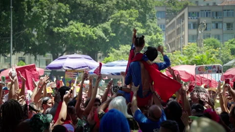 Superman with his Daughter in the Crowd ... | Stock Video | Pond5