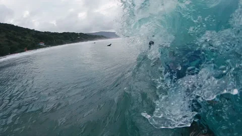 Surf photographer. Man with camera in un... | Stock Video | Pond5