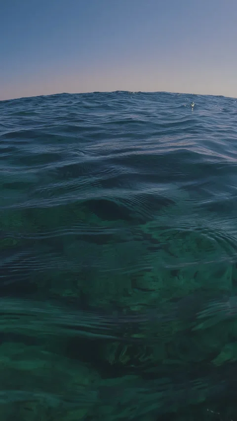 Surface of water with curved horizon lin... | Stock Video | Pond5