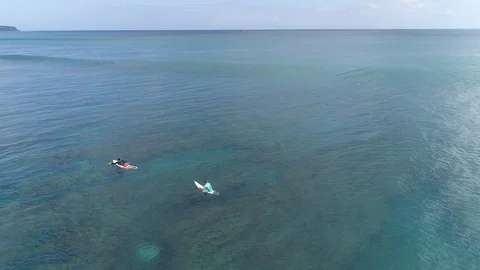 Surfer ride on waves in ocean sunset, to... | Stock Video | Pond5