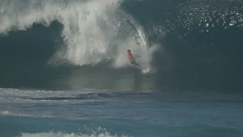 Surfer surfing Banzai Pipeline Hawaii No... | Stock Video | Pond5
