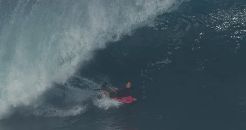 Surfer surfing barrel tube wave at Banza... | Stock Video | Pond5