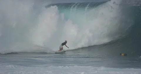 Surfer surfing barrel tube wave at Banza... | Stock Video | Pond5