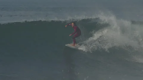 Surfer surfing big ocean wave at Cardiff... | Stock Video | Pond5