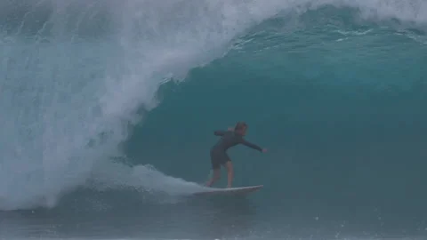 Surfer surfing Pipeline barrel tube big ... | Stock Video | Pond5