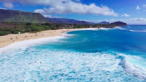 Surfers ride ocean waves at Makaha surf ... | Stock Video | Pond5