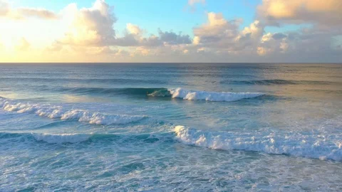 Surfers Ride Waves in Tropical Blue Ocea... | Stock Video | Pond5