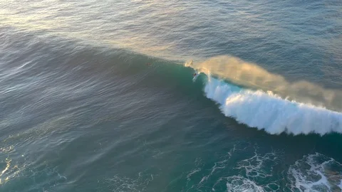 Surfers Ride Waves in Tropical Blue Ocea... | Stock Video | Pond5