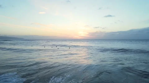 Surfers Waiting For The Next Wave At Sun... | Stock Video | Pond5