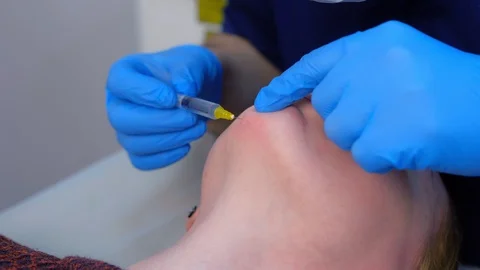 Surgeon making anesthesia injection on w... | Stock Video | Pond5