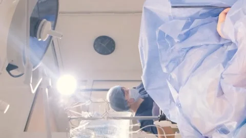 Surgeons operate on the legs of an elder... | Stock Video | Pond5