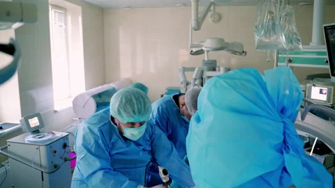 Surgical procedure. Professional doctors... | Stock Video | Pond5