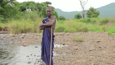 Suri tribe man in front of a river, Kibi... | Stock Video | Pond5