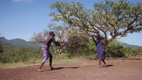 Suri tribe warriors fighting during a do... | Stock Video | Pond5