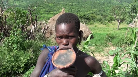 Suri tribe woman wearing a lip plate, Ki... | Stock Video | Pond5