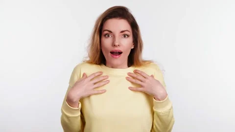 Surprised woman hands up wonder, shocked... | Stock Video | Pond5