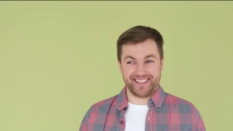 Surprised young man shaking his head on ... | Stock Video | Pond5