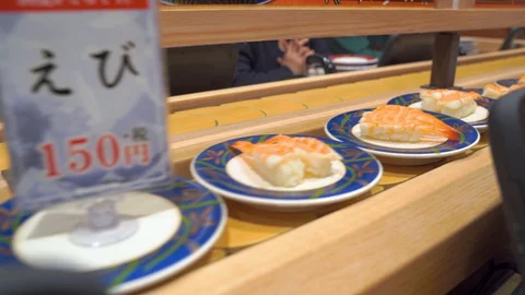 Sushi rail restaurant with rotating Japa... | Stock Video | Pond5
