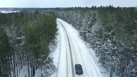 SUV Car Driving on a Winter Country Road... | Stock Video | Pond5