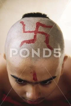Swastika sign on Batu head, Thread Ceremony Copyright: xManojxNavalkar ...