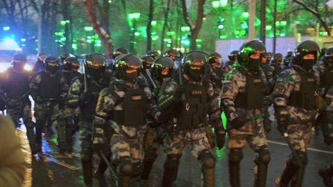 SWAT cop walk at night. Special force go... | Stock Video | Pond5