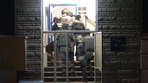 Swat Police Officers Preparing To Break ... | Stock Video | Pond5